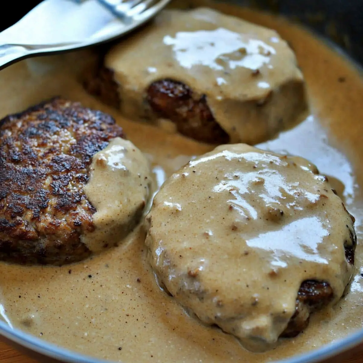 Savory Hamburger Steak with Creamy Country Gravy Bliss – FHFOODHEALTH